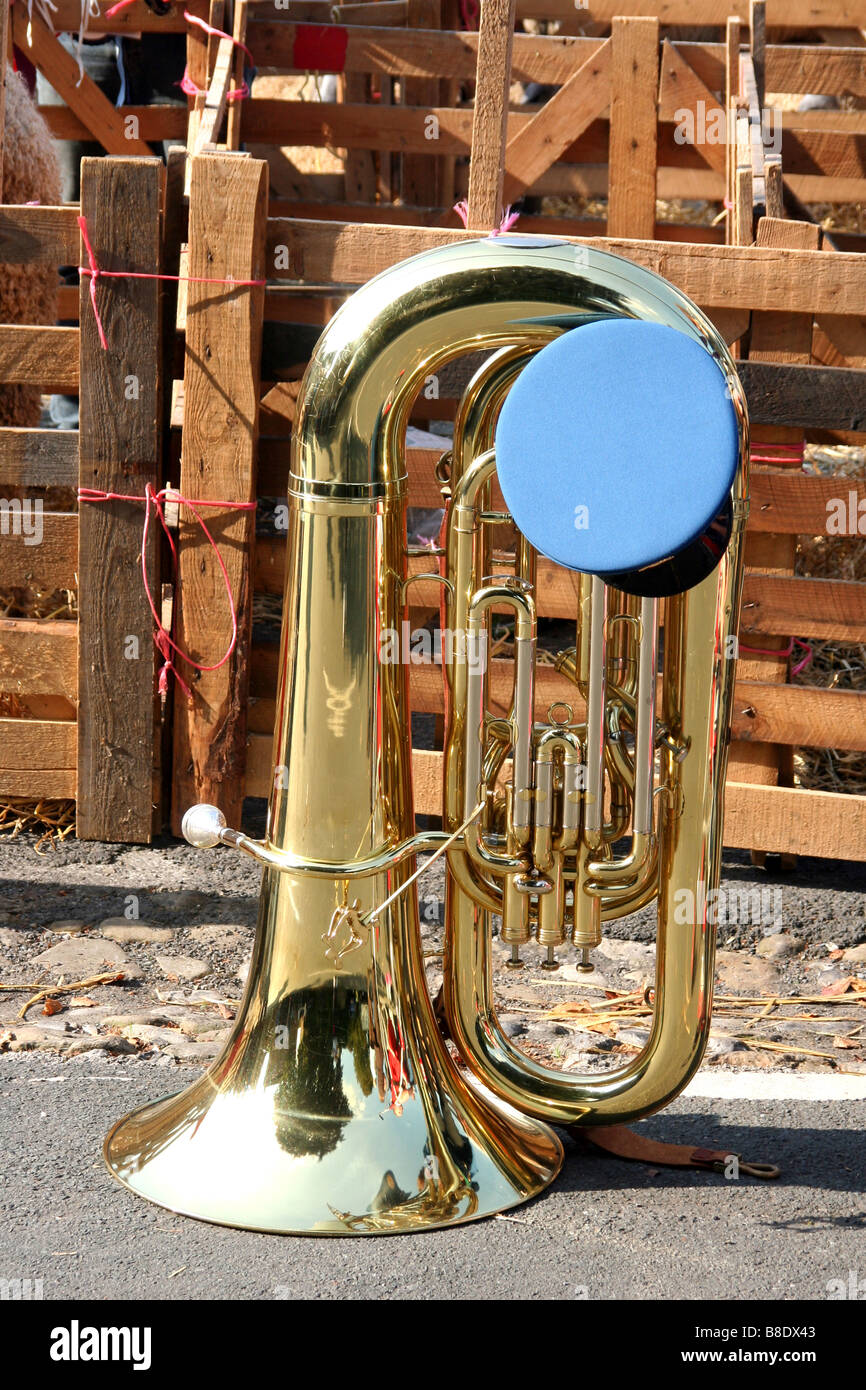 Abandoned brass instrument with player's hat at Masham Sheep Fair Stock ...