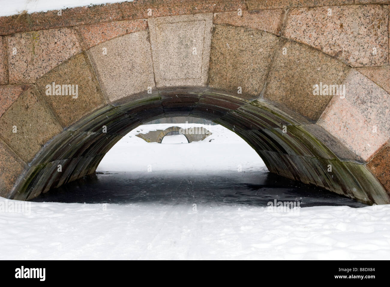 View from the ice on оne stone bridge through arch of another one Stock ...