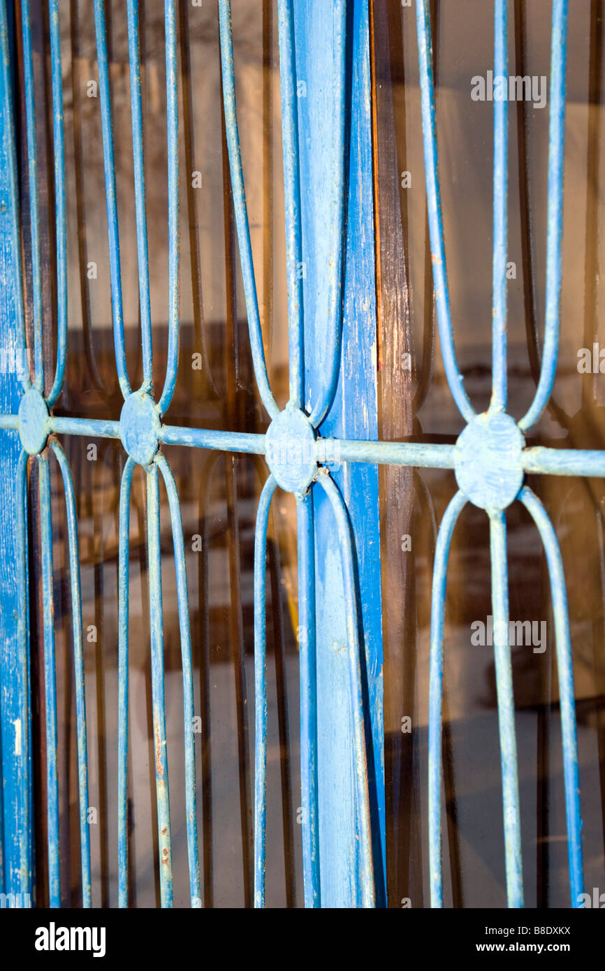 Blue gratings over tinted glass window Stock Photo - Alamy