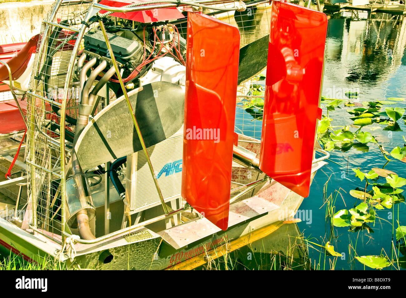 Airboat closeup mechanical details vertical red rudders airplane-style ...