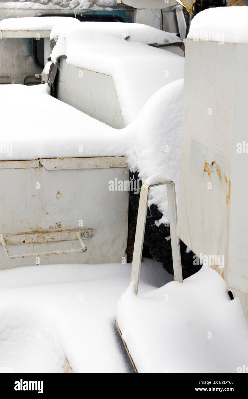 Detail of metal boxes on lorry covered with snow Stock Photo - Alamy