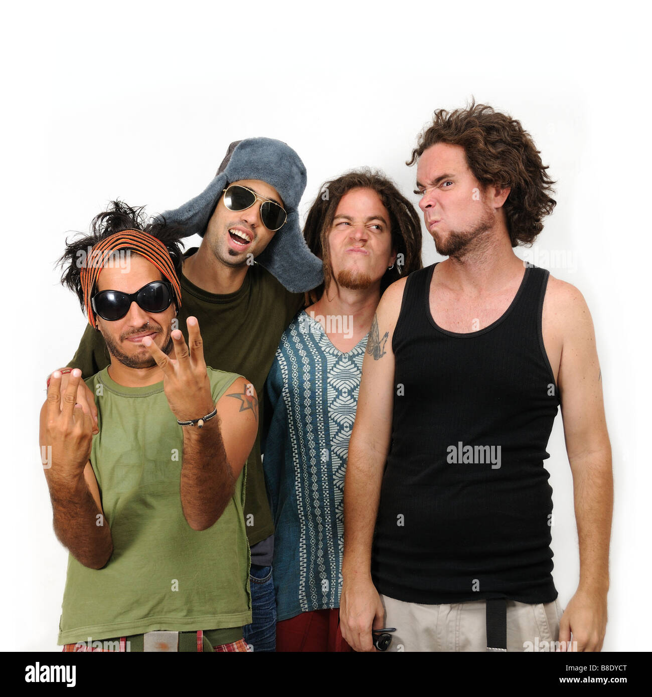 Crazy team of young friends standing isolated Stock Photo - Alamy