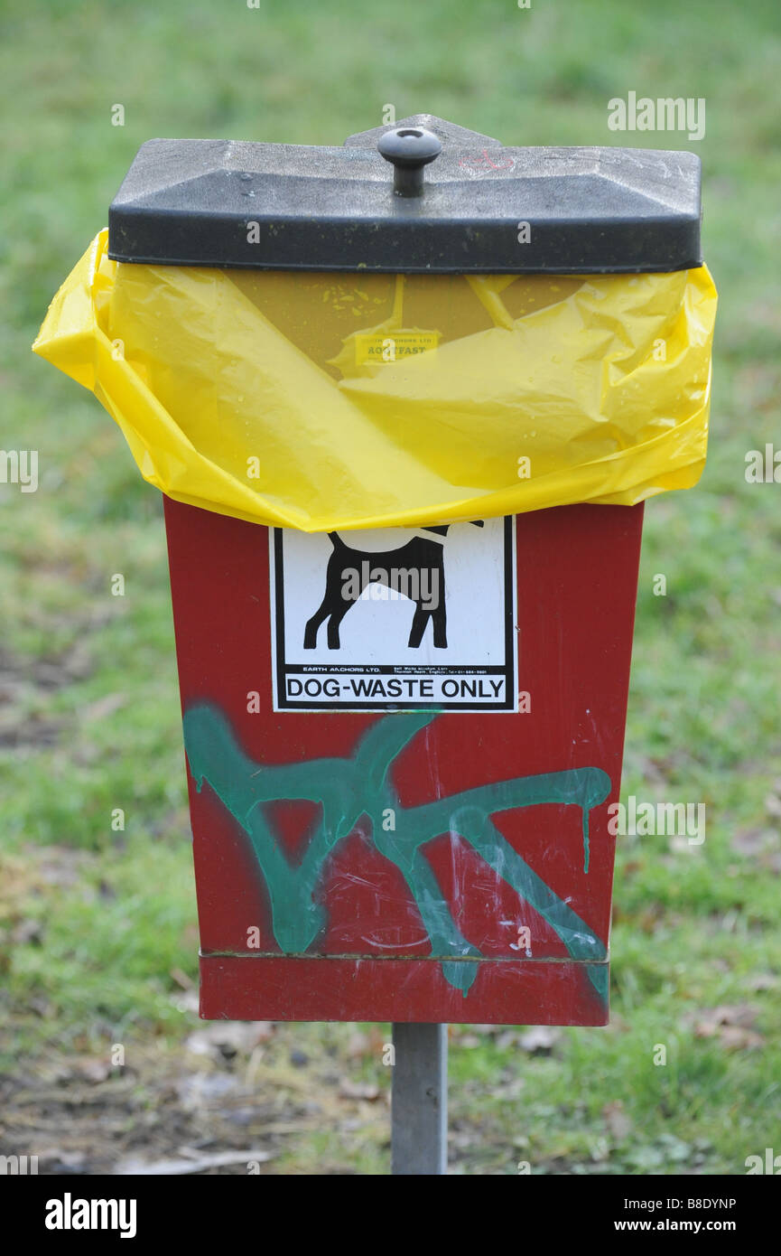 Dog Waste Bin with graffiti Stock Photo - Alamy