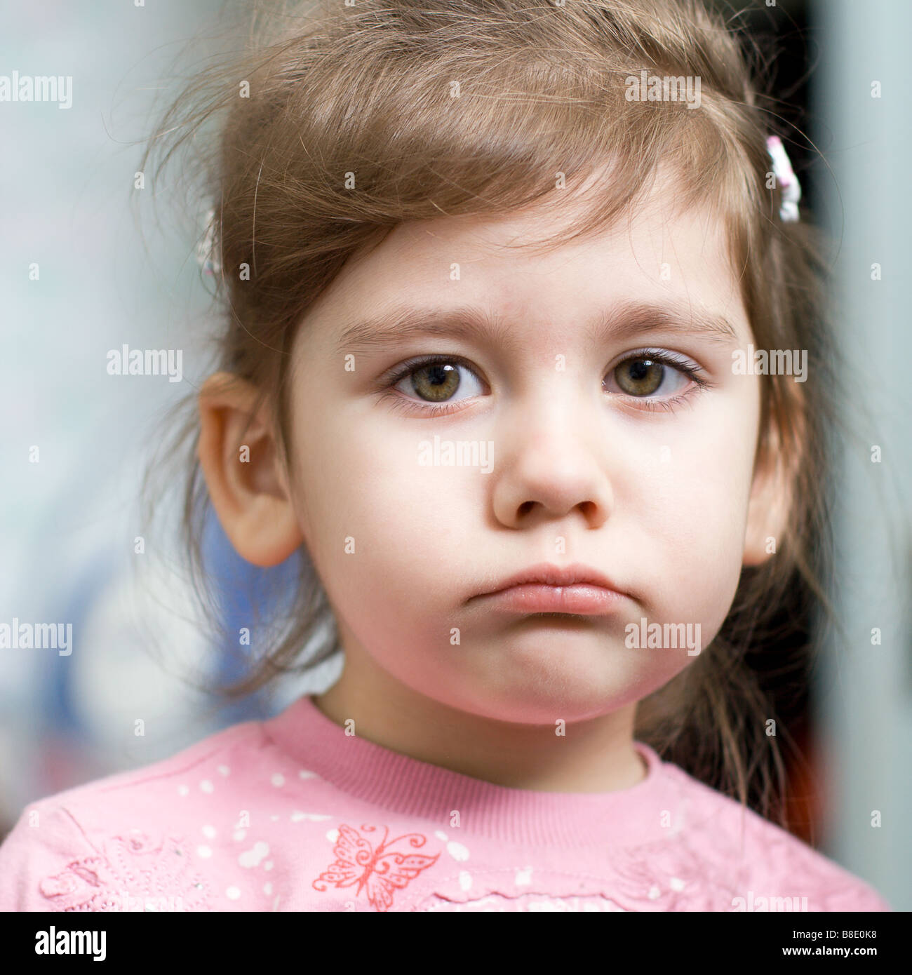 portrait of a disappointed little girl Stock Photo - Alamy