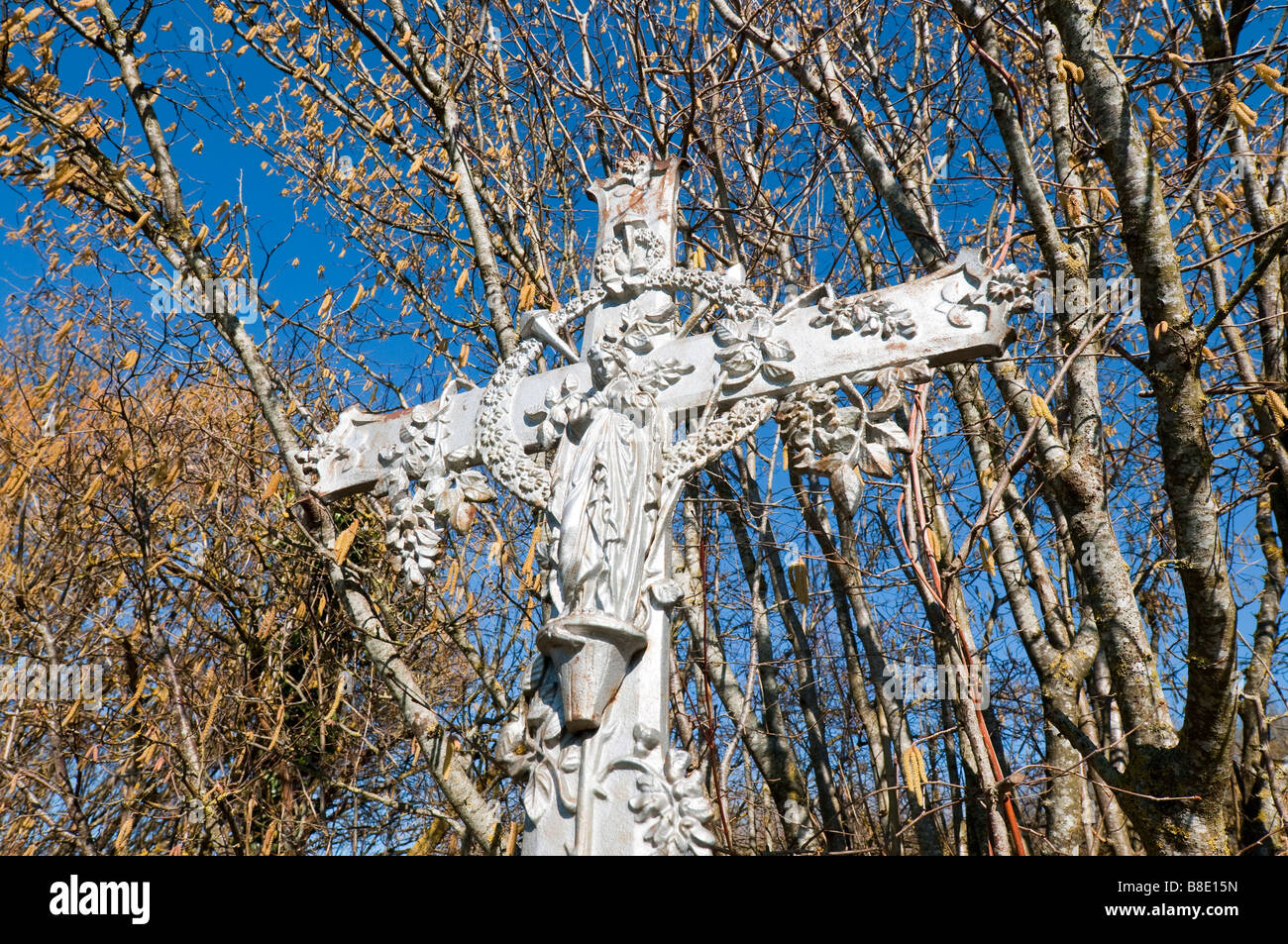 Roadside silver painted iron cross - France Stock Photo - Alamy