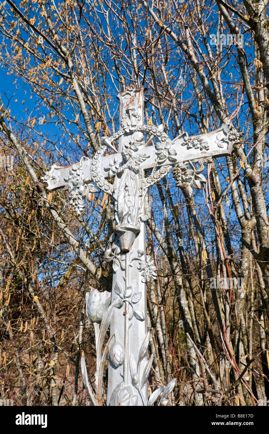 Roadside silver painted iron cross - France Stock Photo - Alamy
