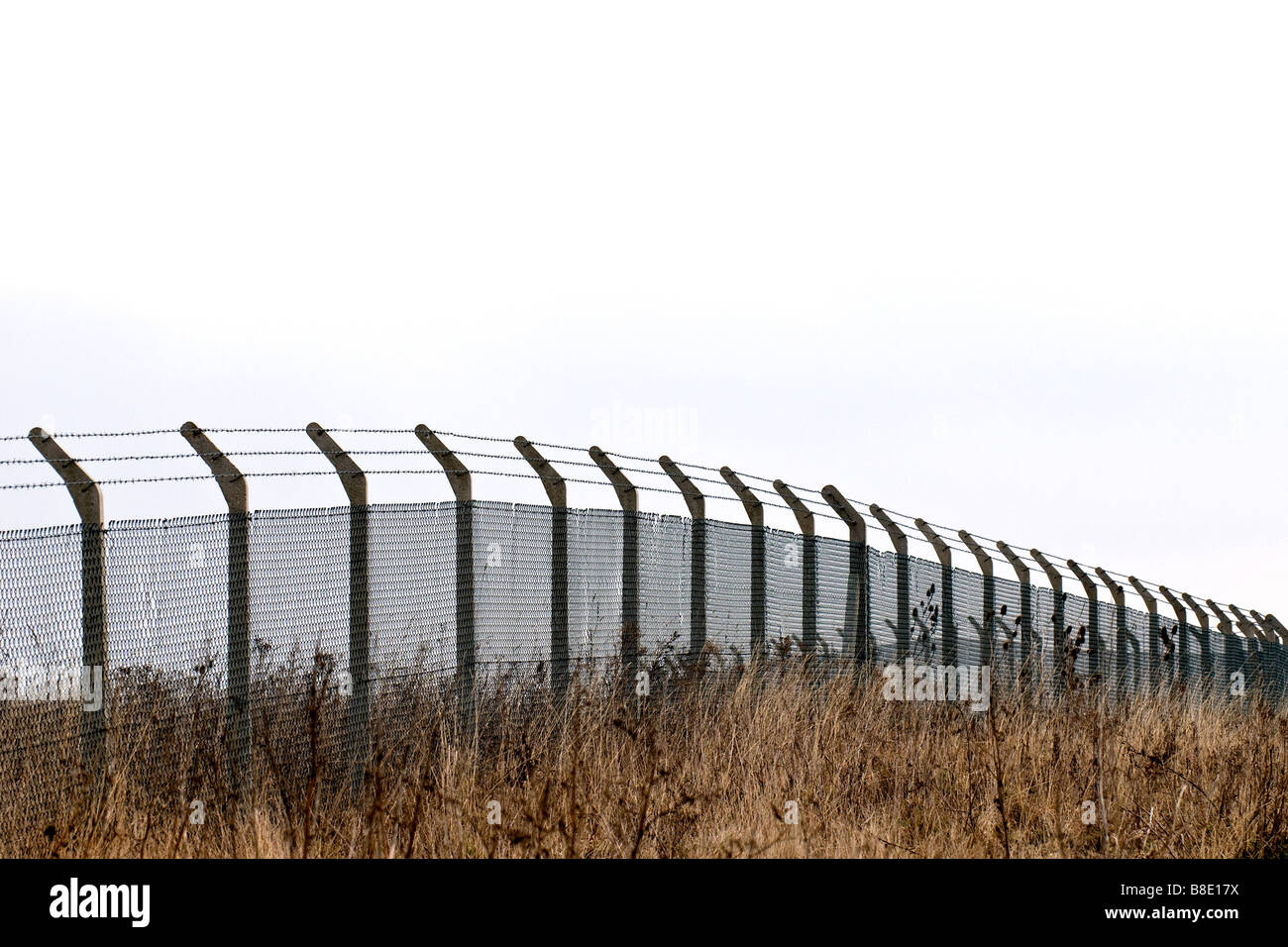 A security fence Stock Photo - Alamy