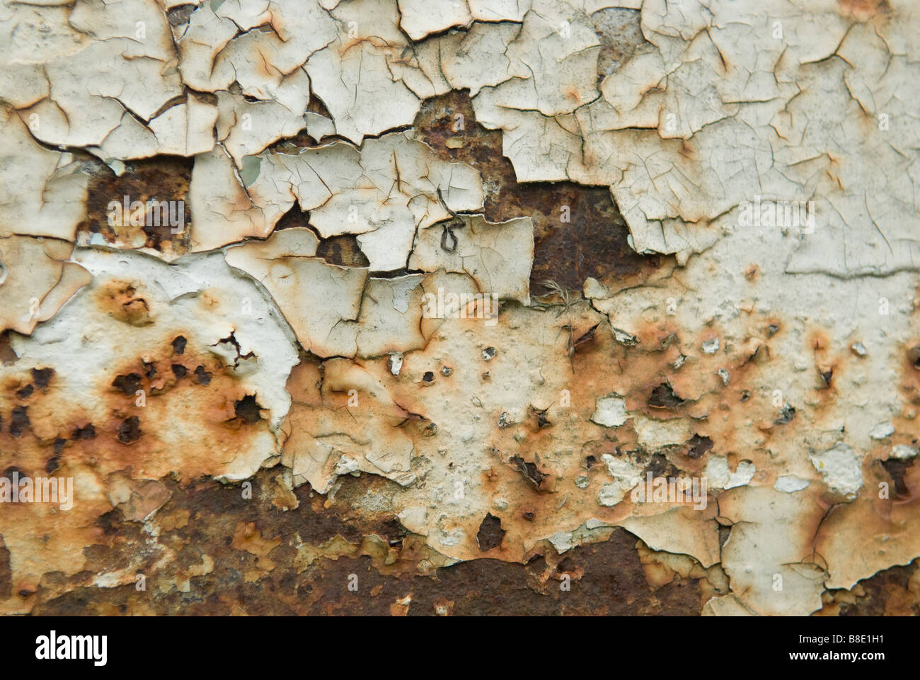 cracked pantwork on rusty metal Stock Photo - Alamy