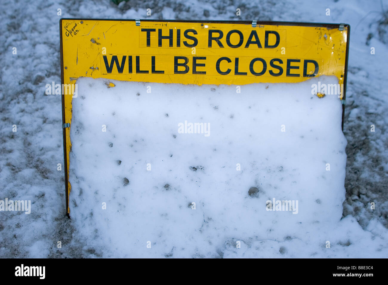 Road sign Covered by snow Stock Photo - Alamy