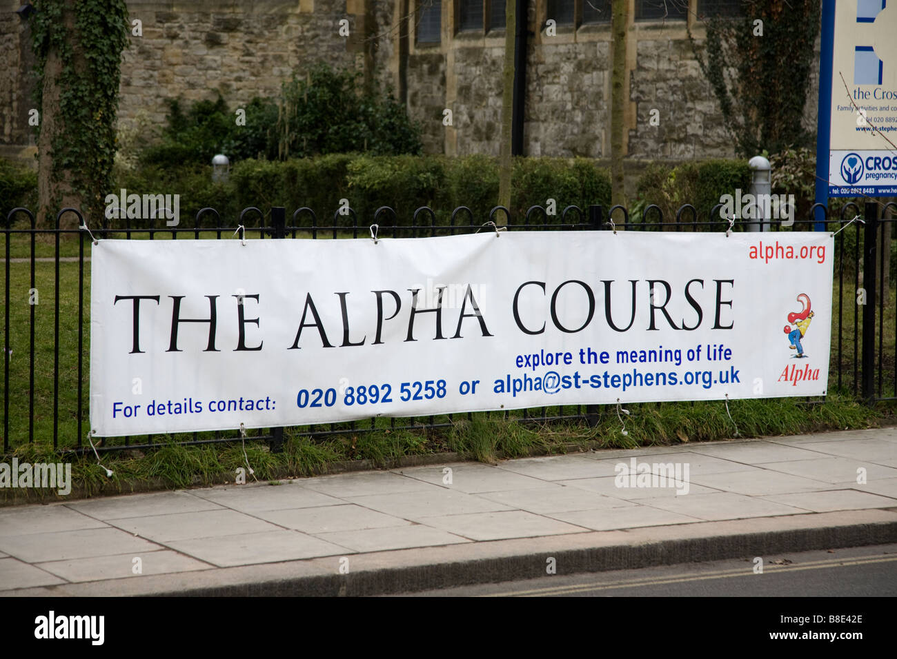 Banner promoting the Alpha Course outside a church in west London Stock ...