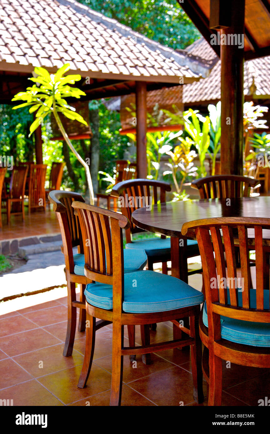 Chairs around dinner table Stock Photo - Alamy