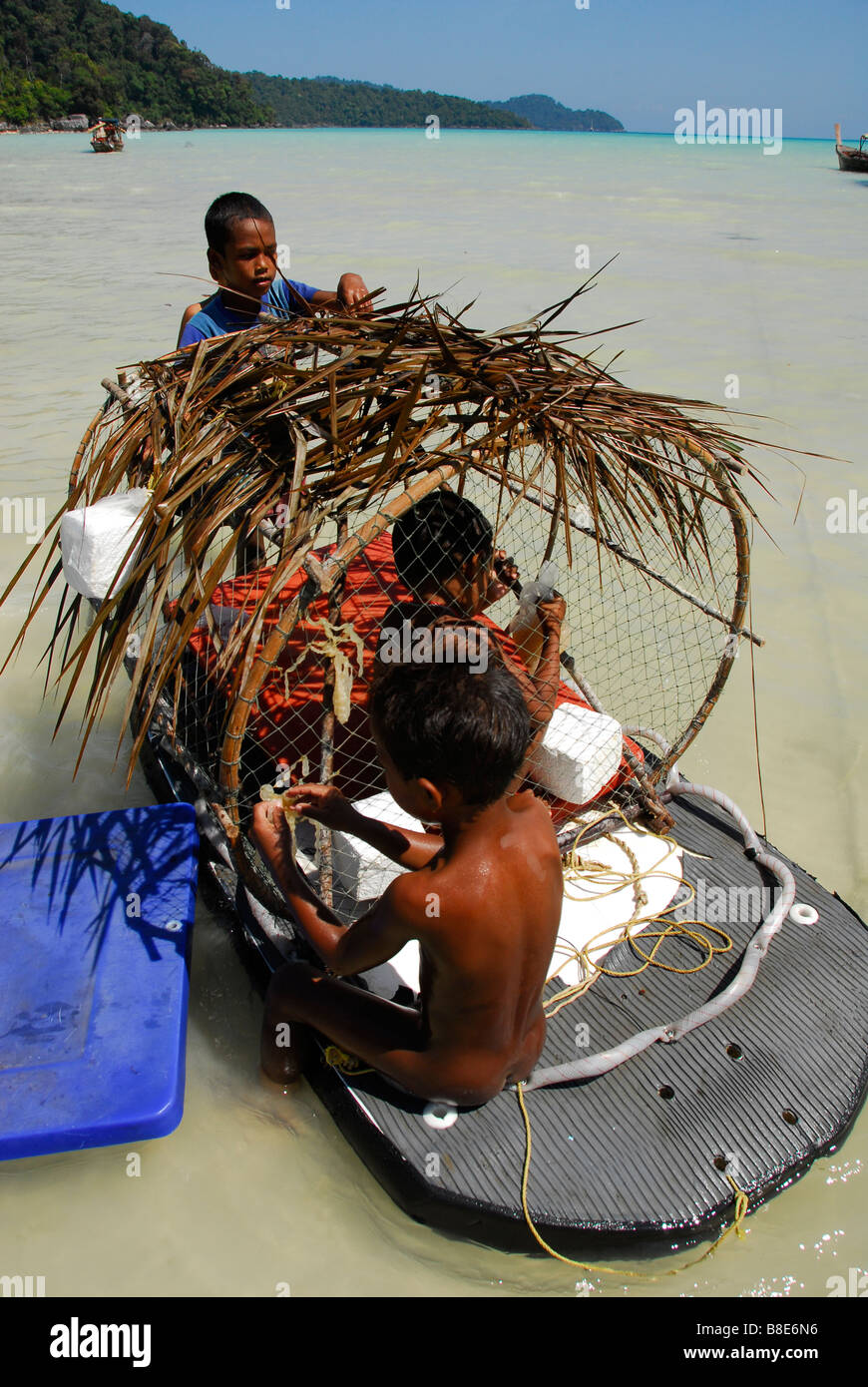 Moken kids enjoy playing with thier boat,Koh Surin,Phangnga,Southern ...