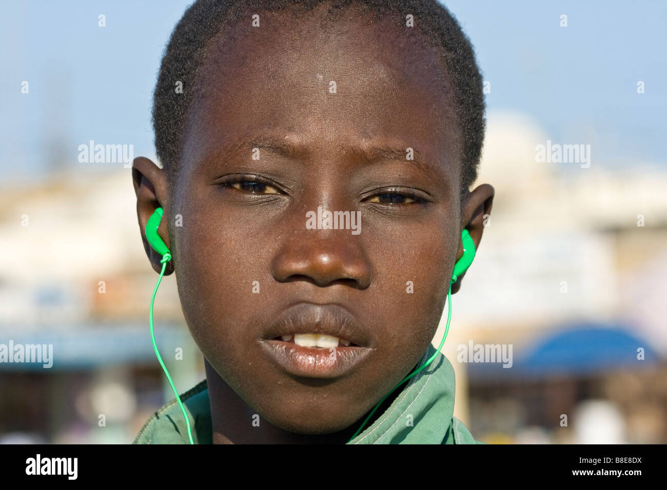 Senegalese Boy Wearing Earphones in St Louis in Senegal West Africa ...
