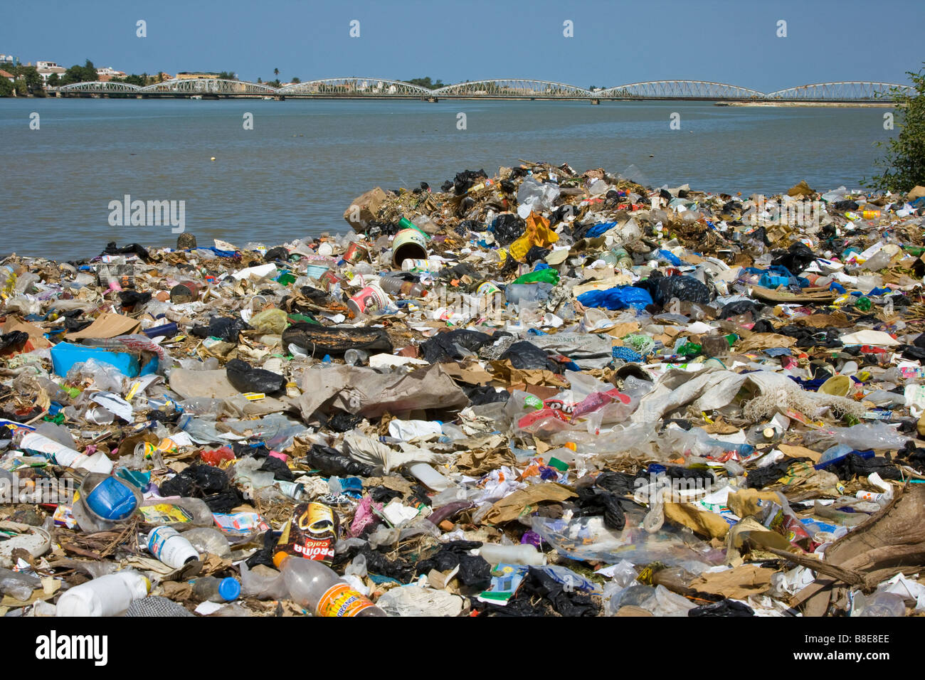 Pollution Waste and the Faidherbe Bridge in St Louis in Senegal Africa ...