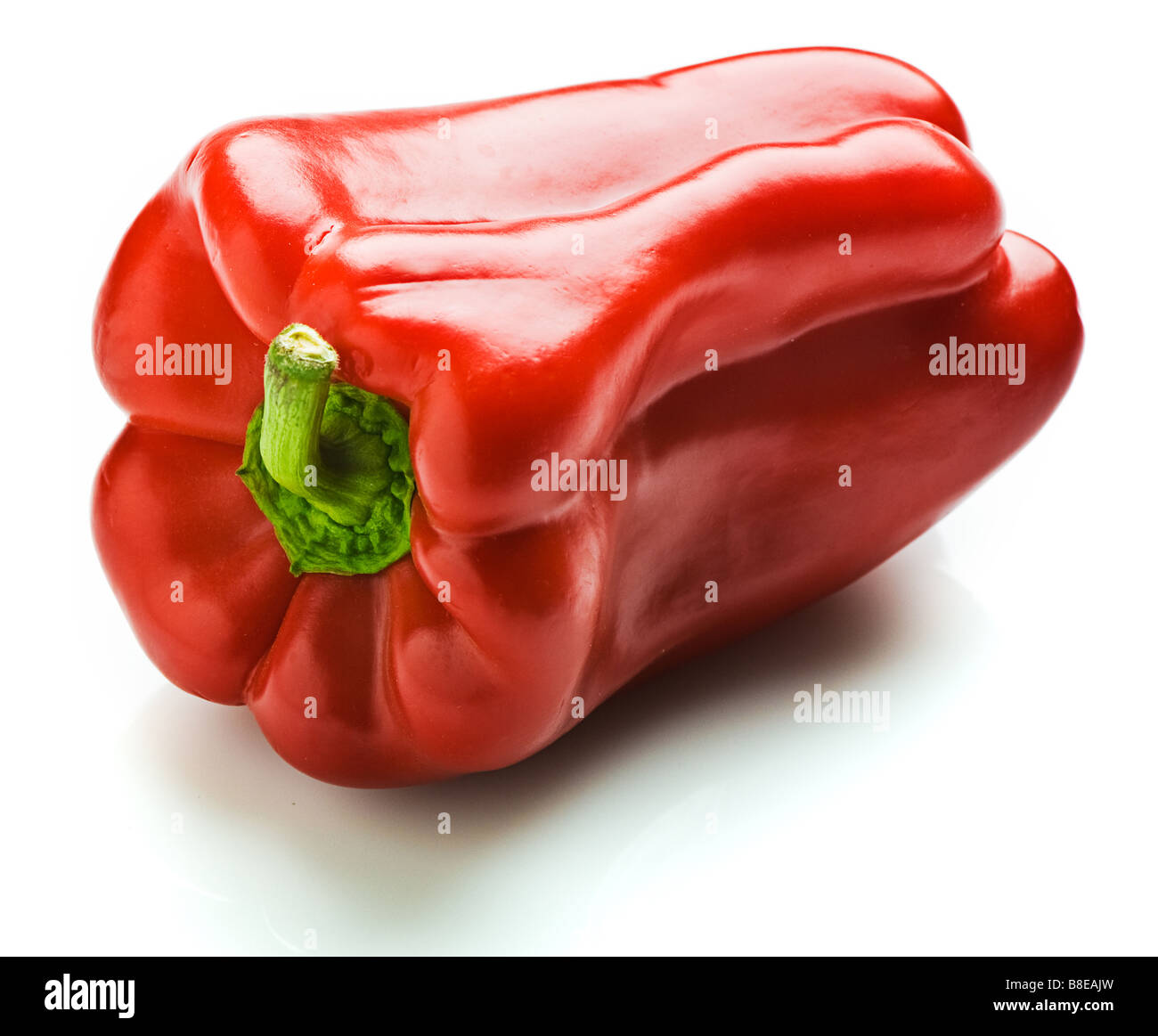 A whole red capsicum Isolated on white Stock Photo - Alamy