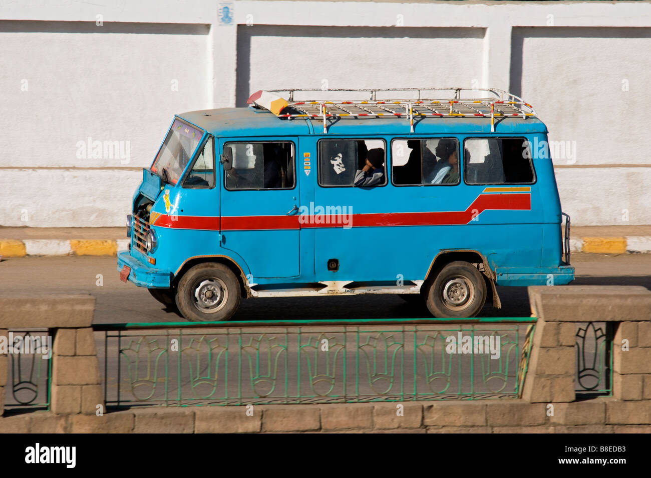 Van heading on road Stock Photo - Alamy