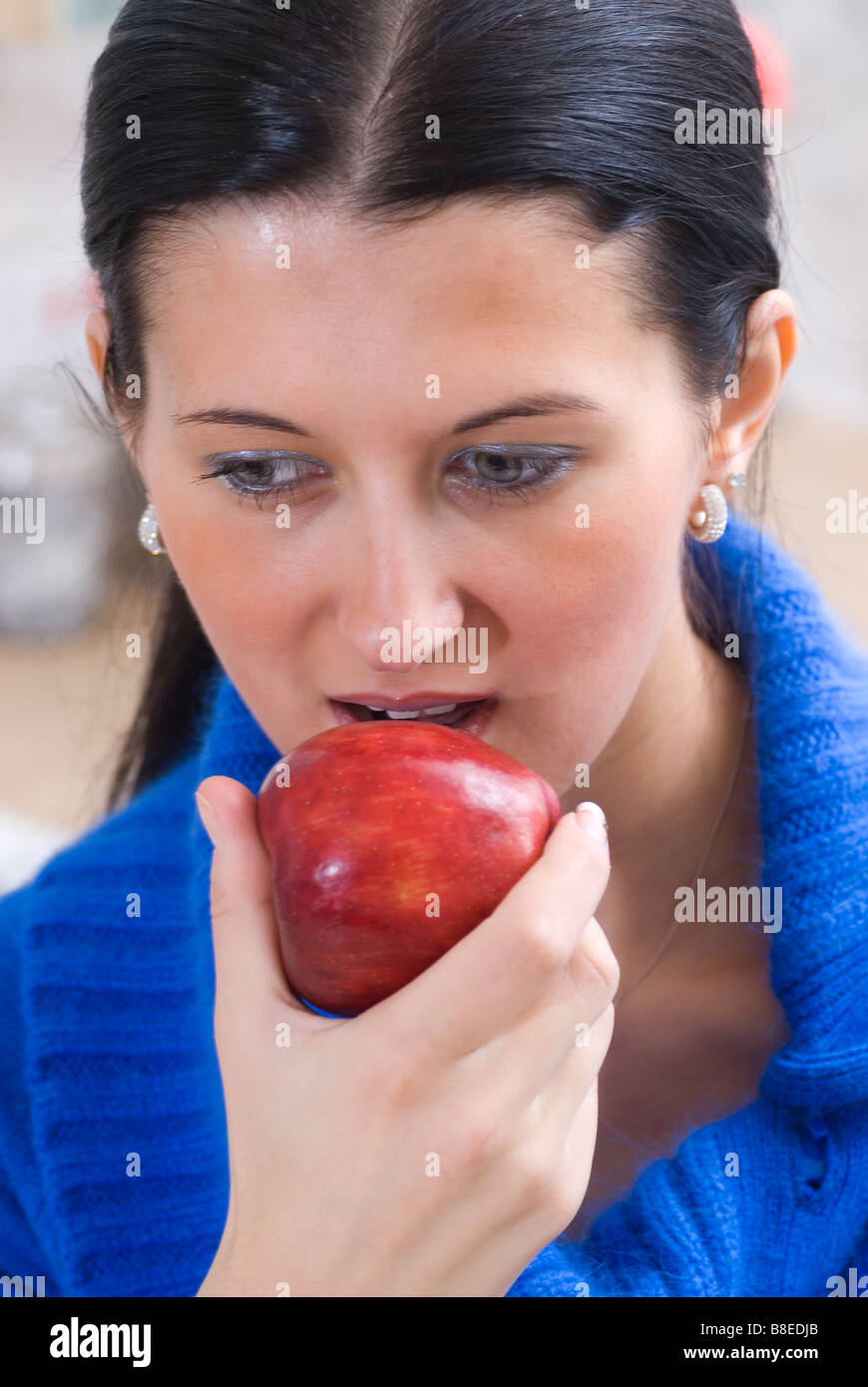 Hand holding red apple dark hi-res stock photography and images - Alamy