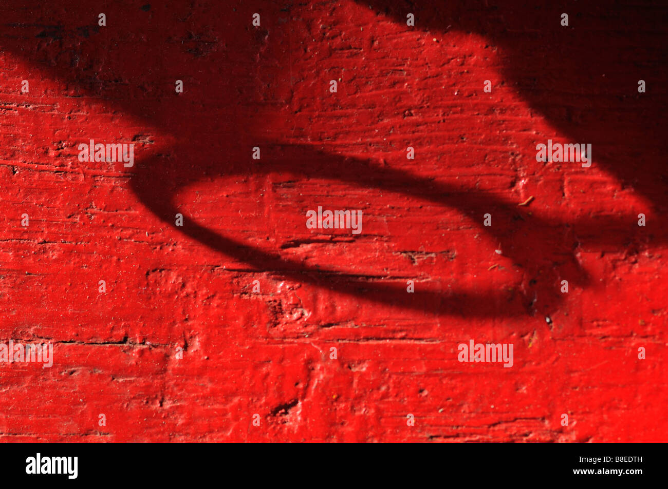 red paint and ellipse shadow Stock Photo - Alamy