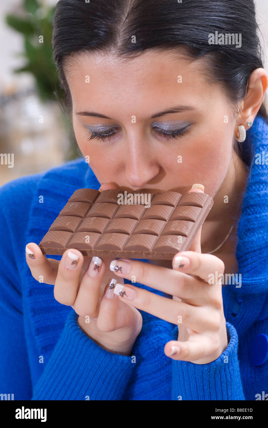Human hands holding chocolate bar hi-res stock photography and images ...