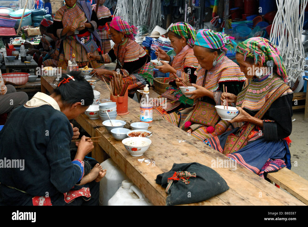 Flower Hmong people eating in Bac Ha village Vietnam Stock Photo - Alamy