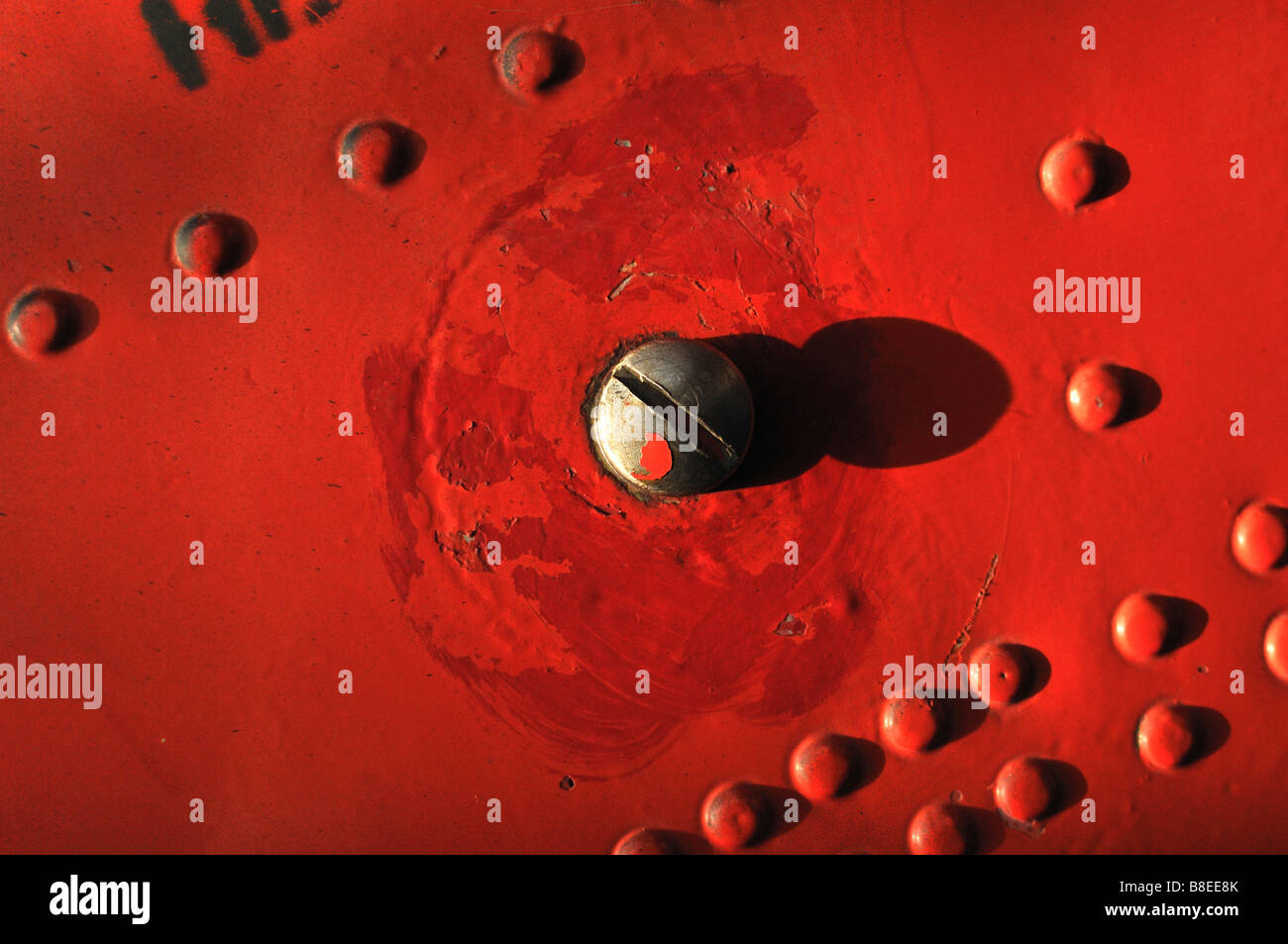 A screw and some rivets on a plane body Stock Photo - Alamy