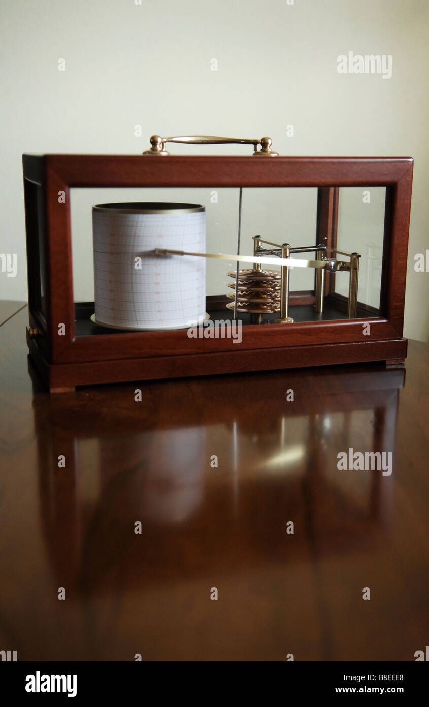 A barogaph used for weather forecasting measuring the barometric ...