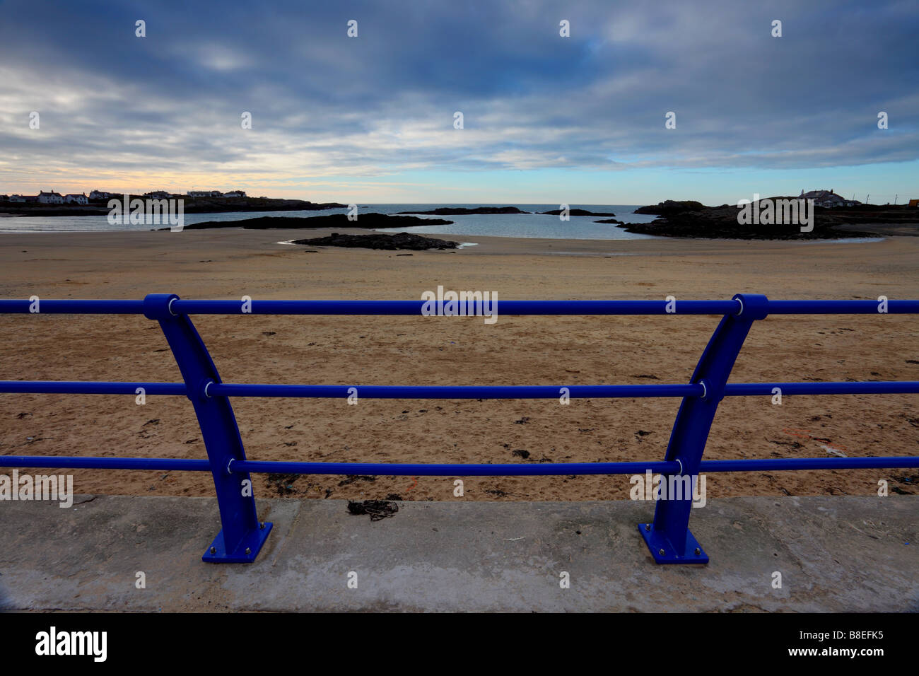 striking blue railings on promenade overlooking the beach behind Stock ...
