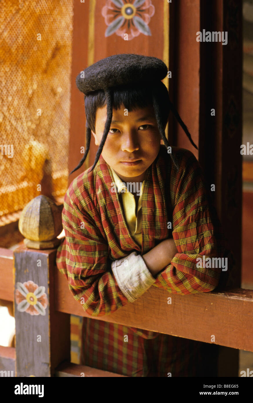 Student wearing hat made out of Yak hair Simtokha Monastery Bhutan ...