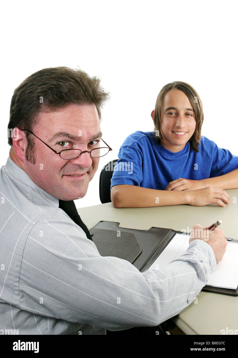 A school counselor and student at an assesment meeting Stock Photo - Alamy