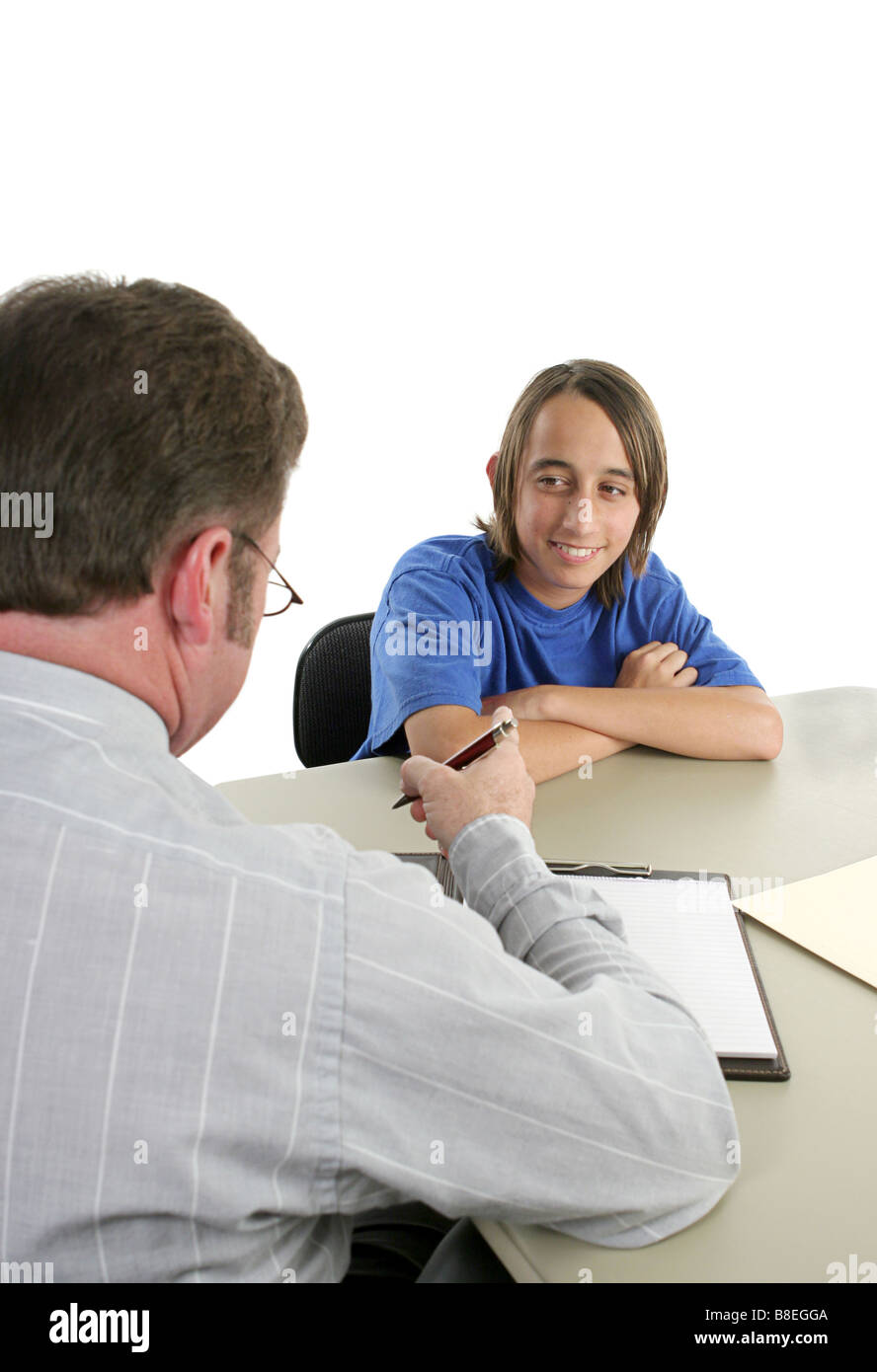 A teen boy being interviewed for his first job Stock Photo - Alamy