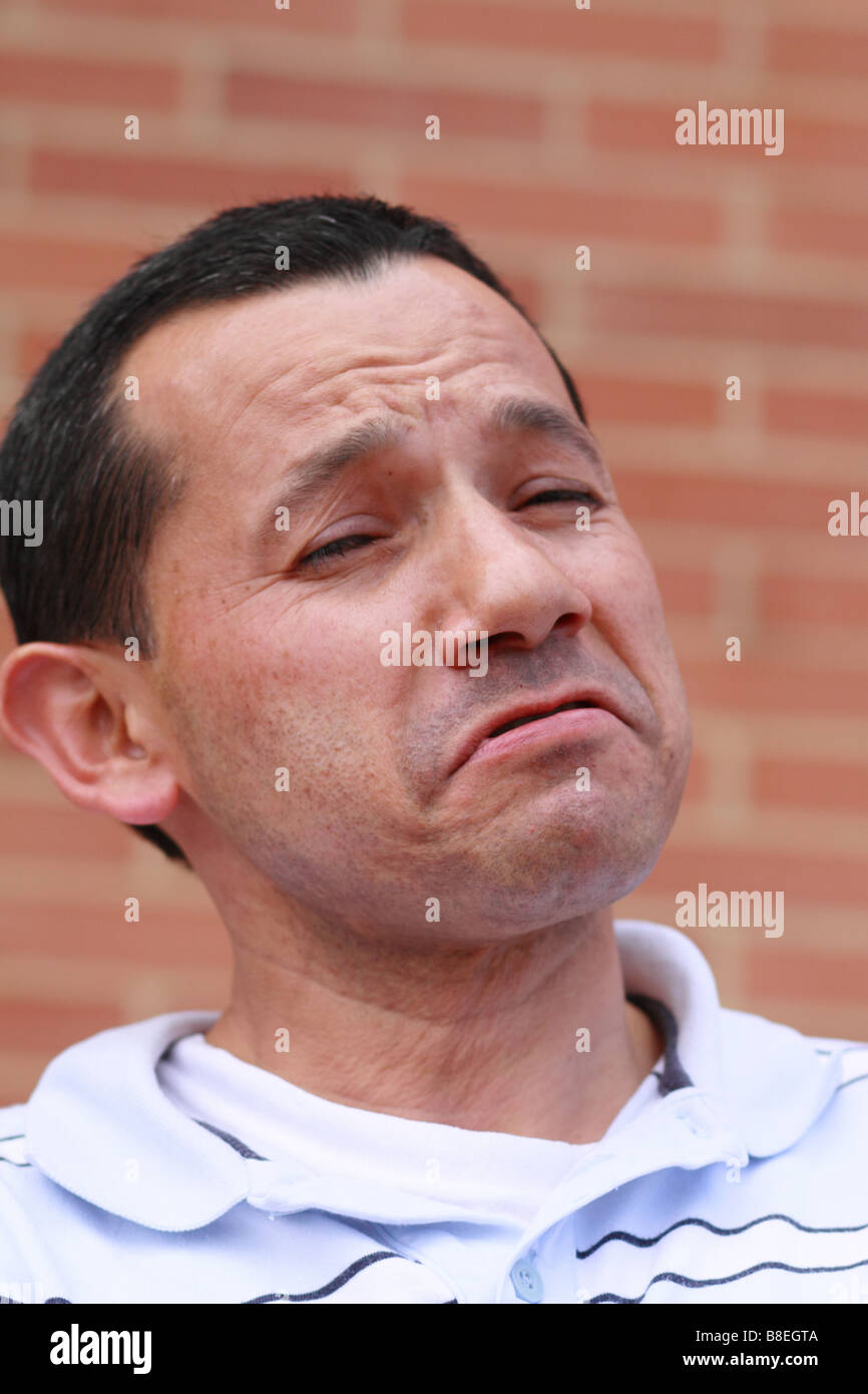 Portrait of a man in a sad attitude Stock Photo - Alamy