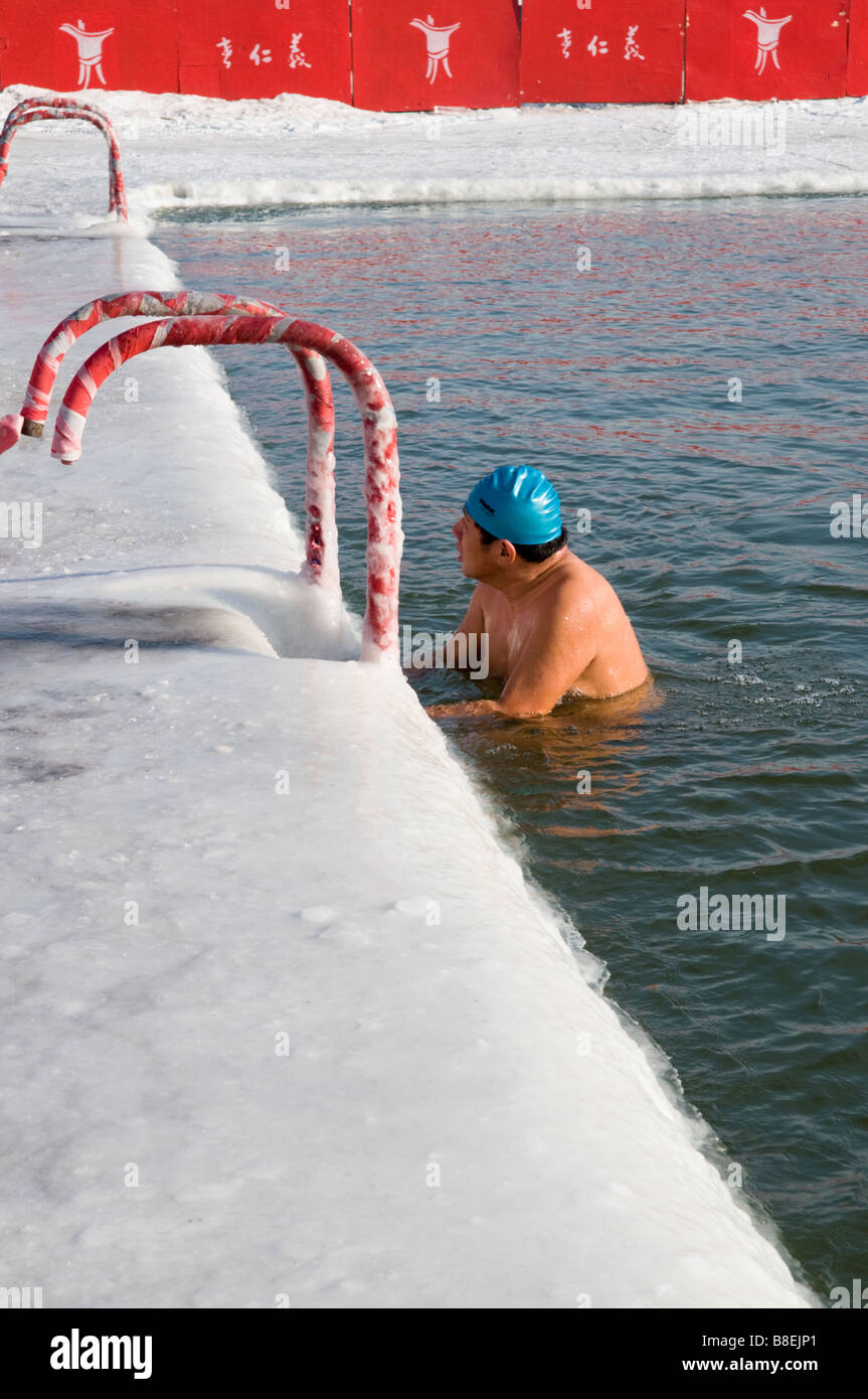 Swimming in the frozen Songhua River, Harbin, Heilongjiang Province ...