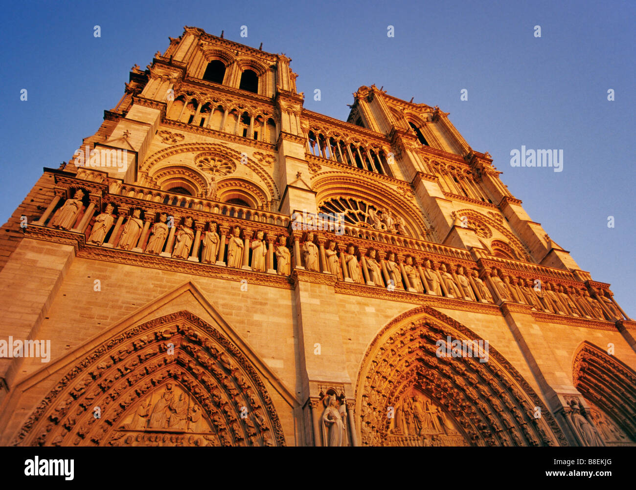 West Front of Notre Dame at sunset Paris France Stock Photo - Alamy