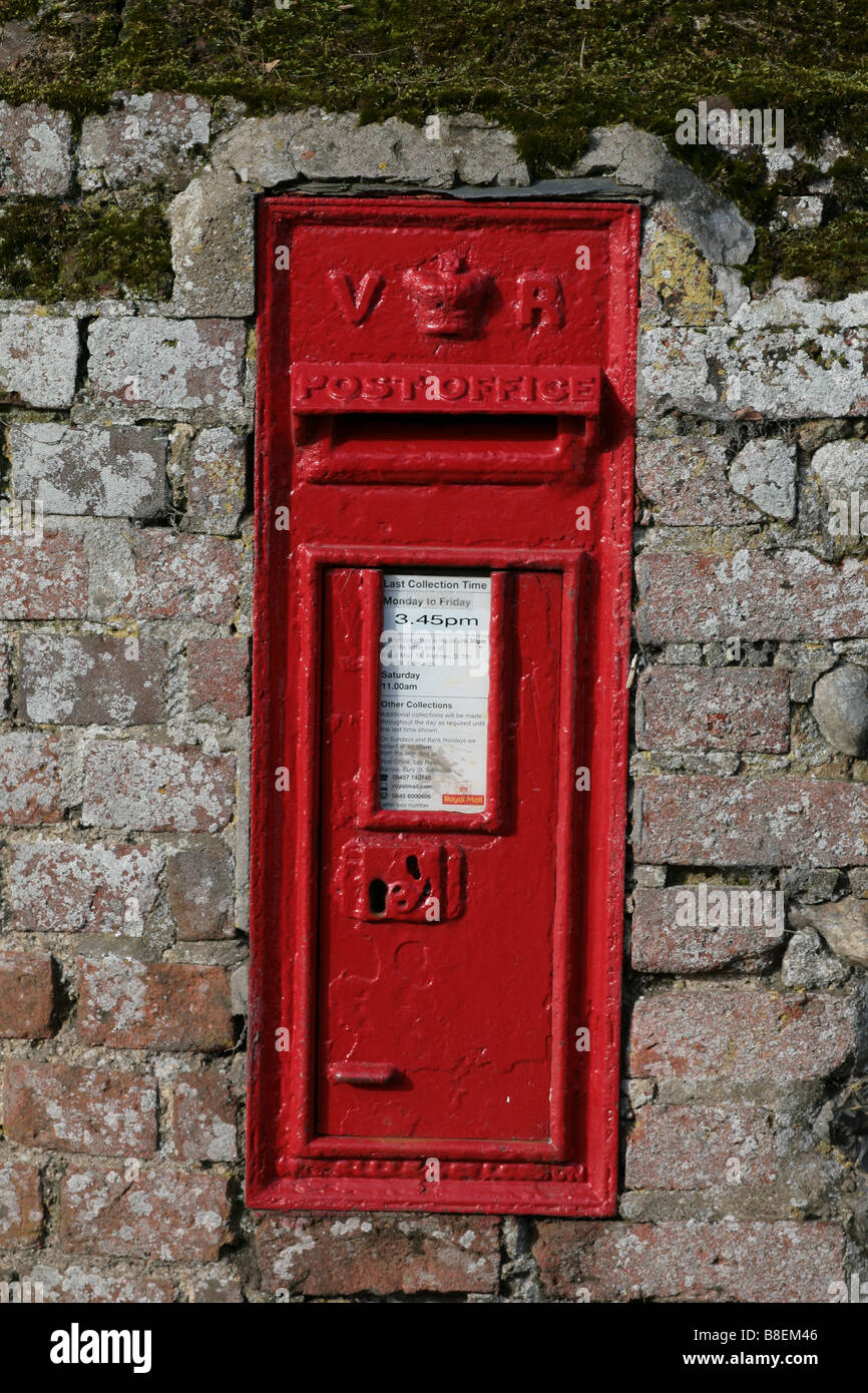 Post box in a stone wall Stock Photo - Alamy