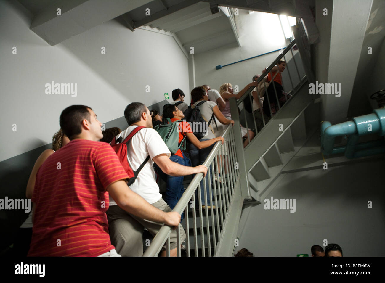 Crowd of people walking up stairs Stock Photo - Alamy