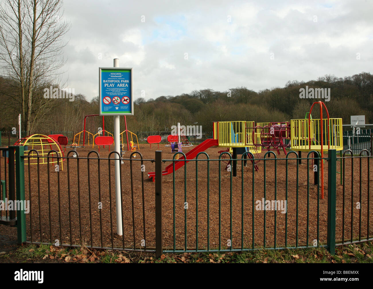 A children's play ground showing slides and climbing frames Stock Photo ...