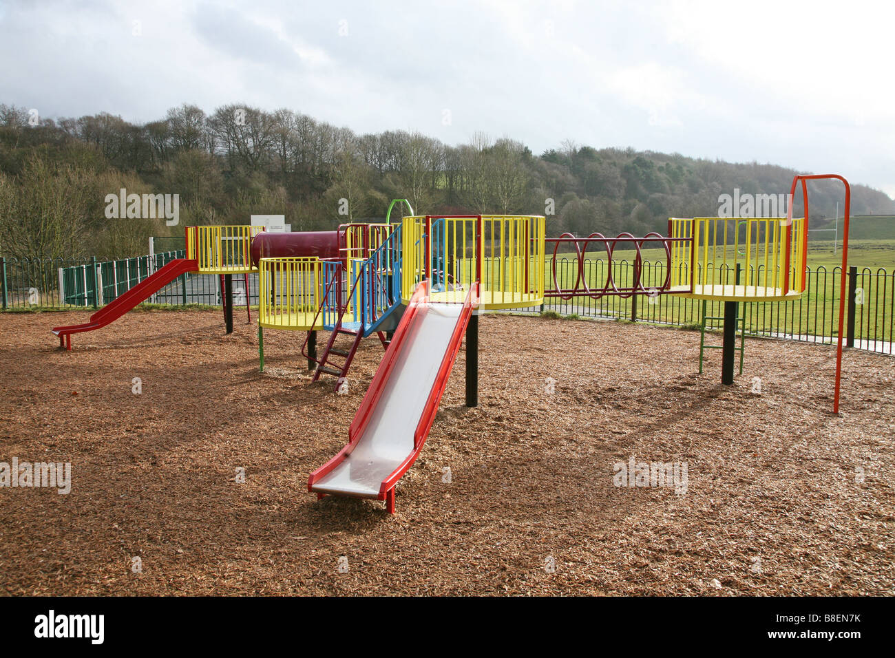 A children's play ground showing slides and climbing frames Stock Photo ...