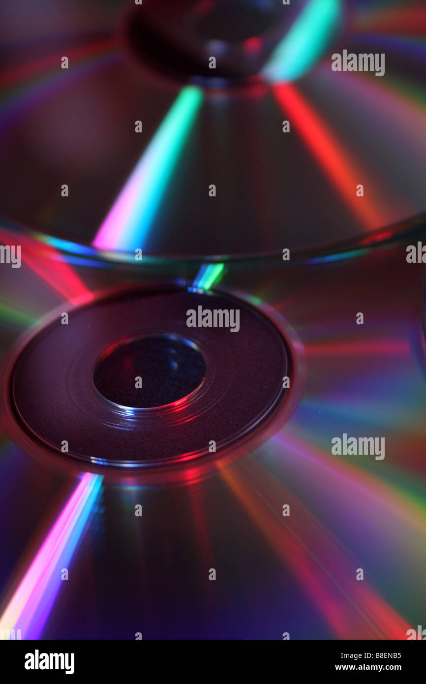 blank Cd's lit with red and blue light Stock Photo - Alamy