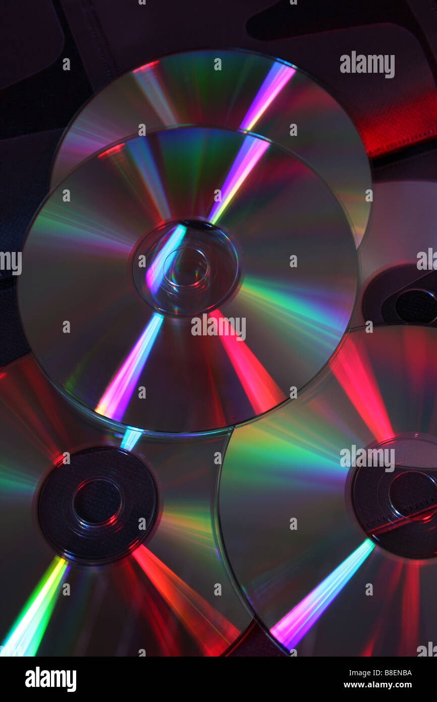 5 Cd's on top of a wallet Stock Photo - Alamy