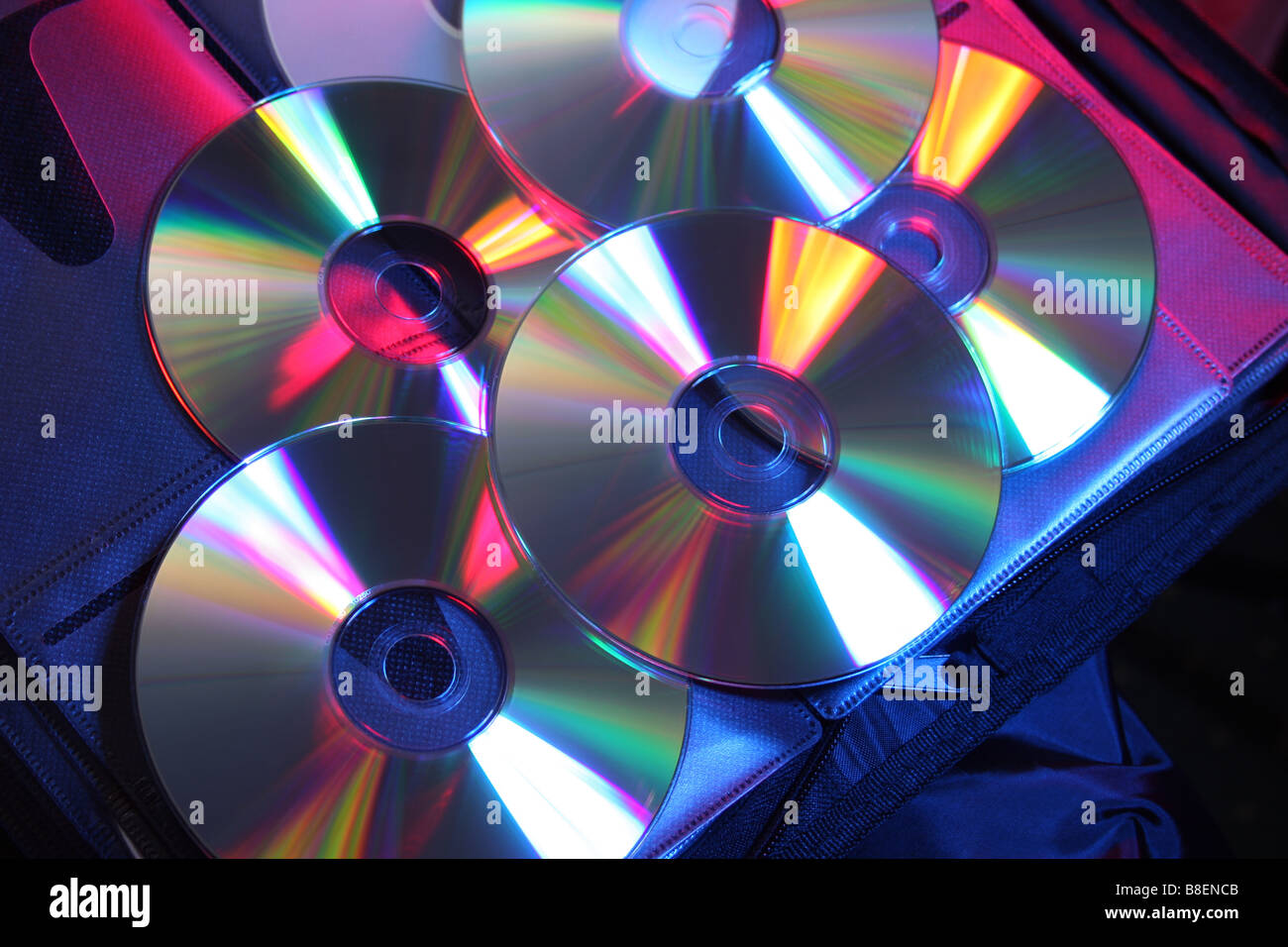 5 Cd's on top of a wallet Stock Photo - Alamy