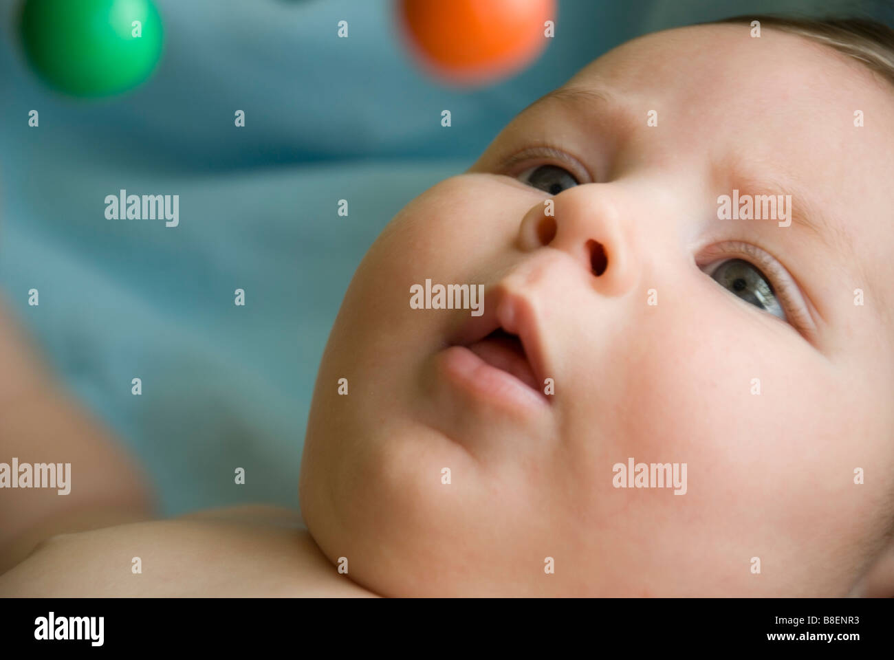baby looking at mobile Stock Photo - Alamy