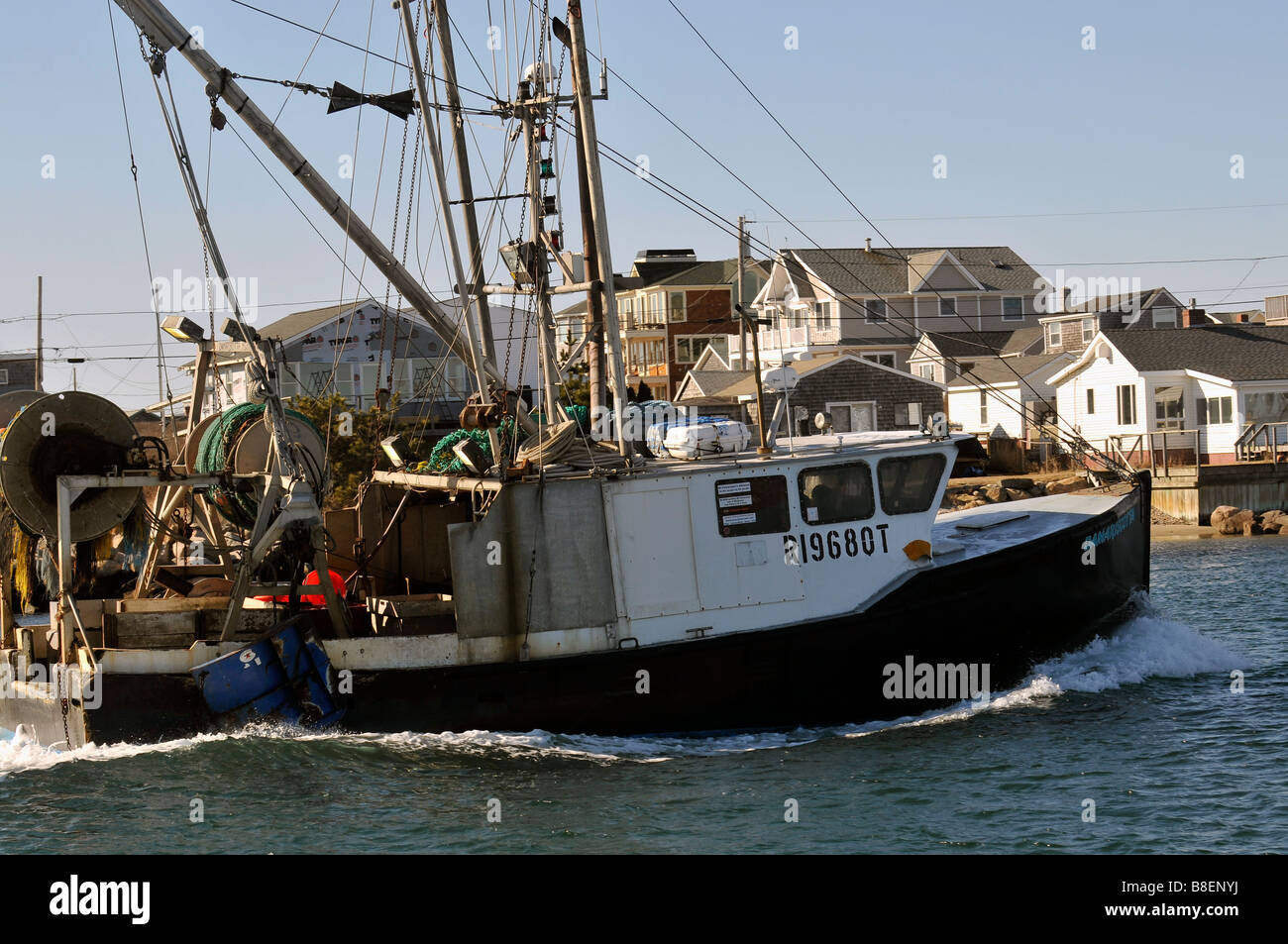 Commercial fishing boat returning to port in Galilee rhode island Stock ...