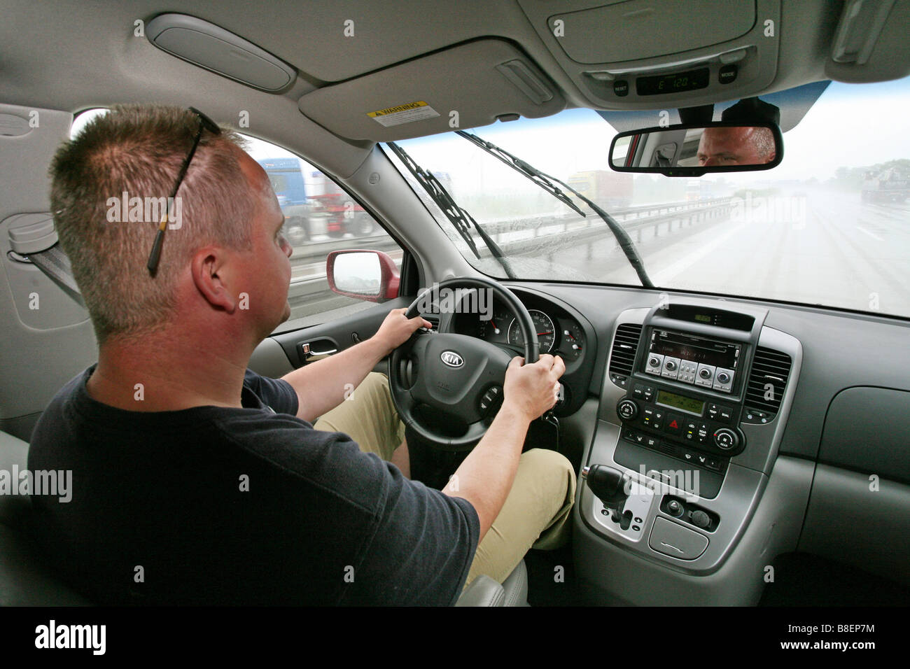 Car front view driver hi-res stock photography and images - Alamy