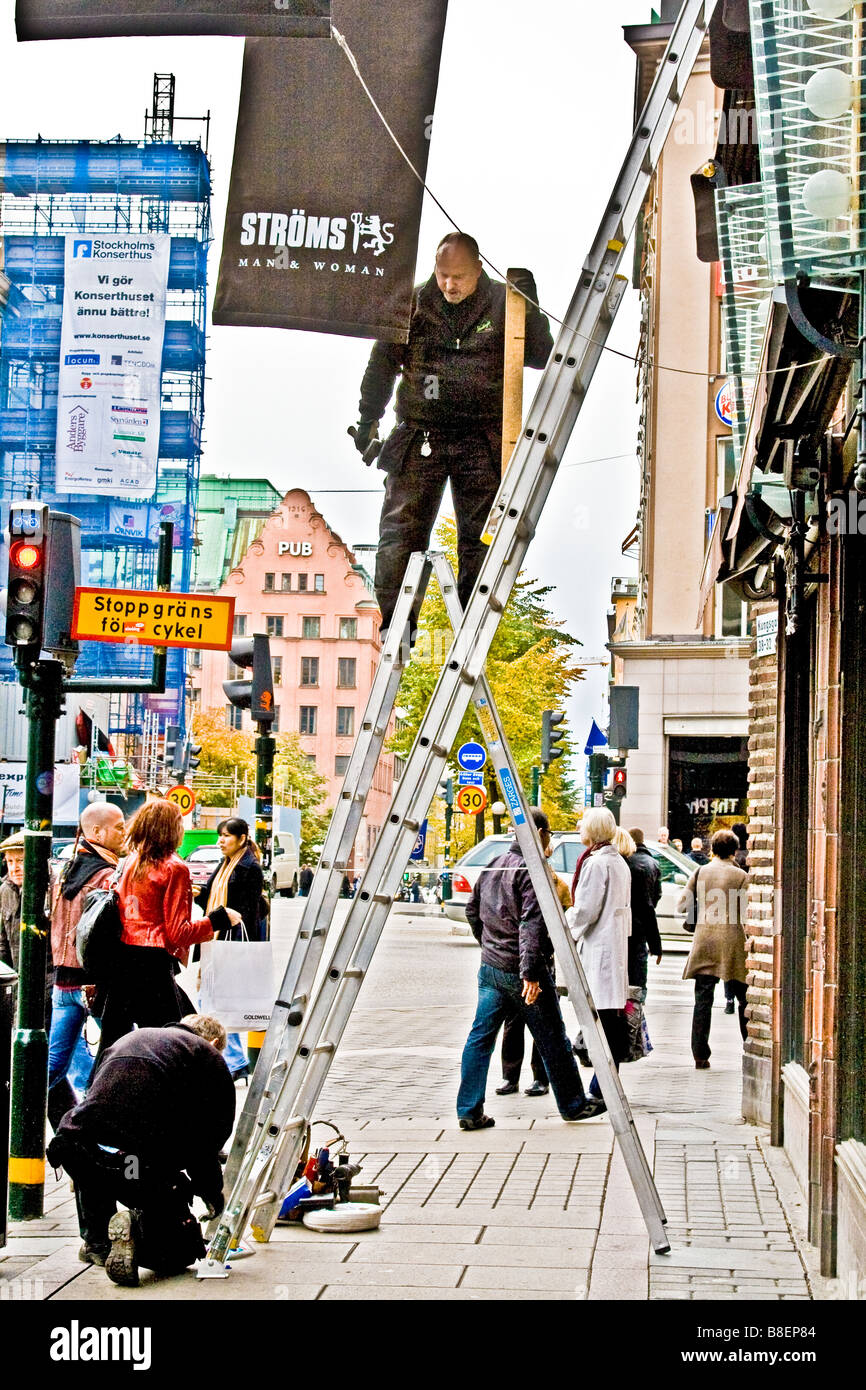 Workers street hi-res stock photography and images - Alamy