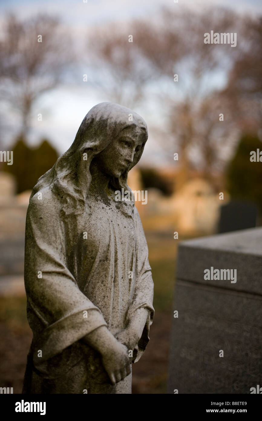 Statue of a Young Girl at a Cemetery Stock Photo - Alamy