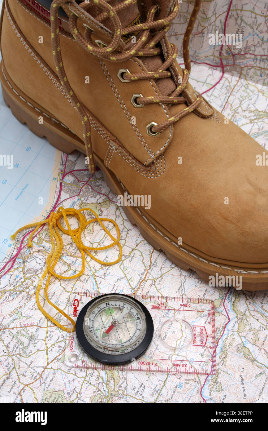 compass and boot on top of a map Stock Photo - Alamy
