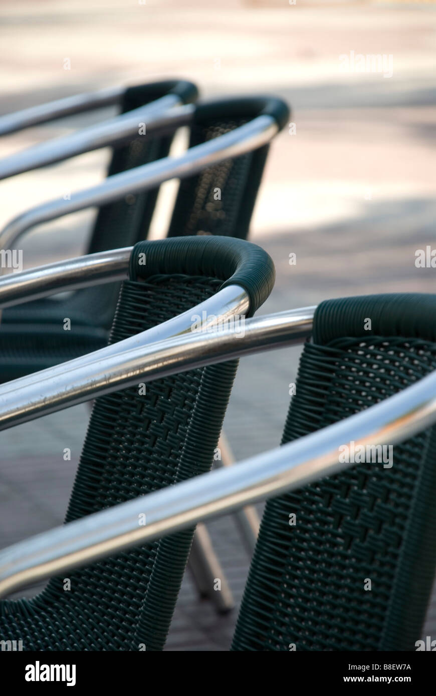Row of many empty green chairs Stock Photo - Alamy
