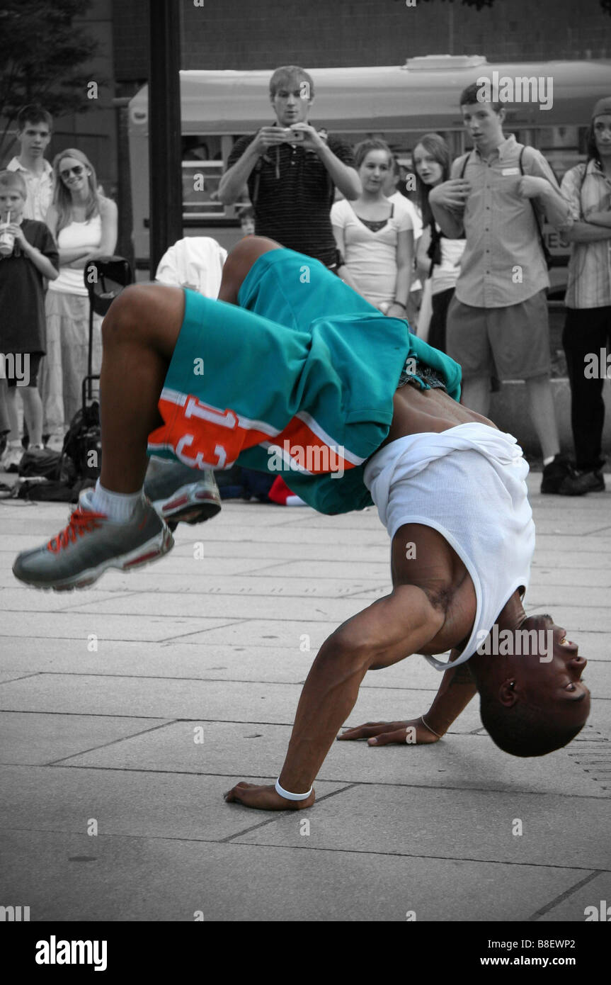 Street performer doing hand stand Stock Photo - Alamy
