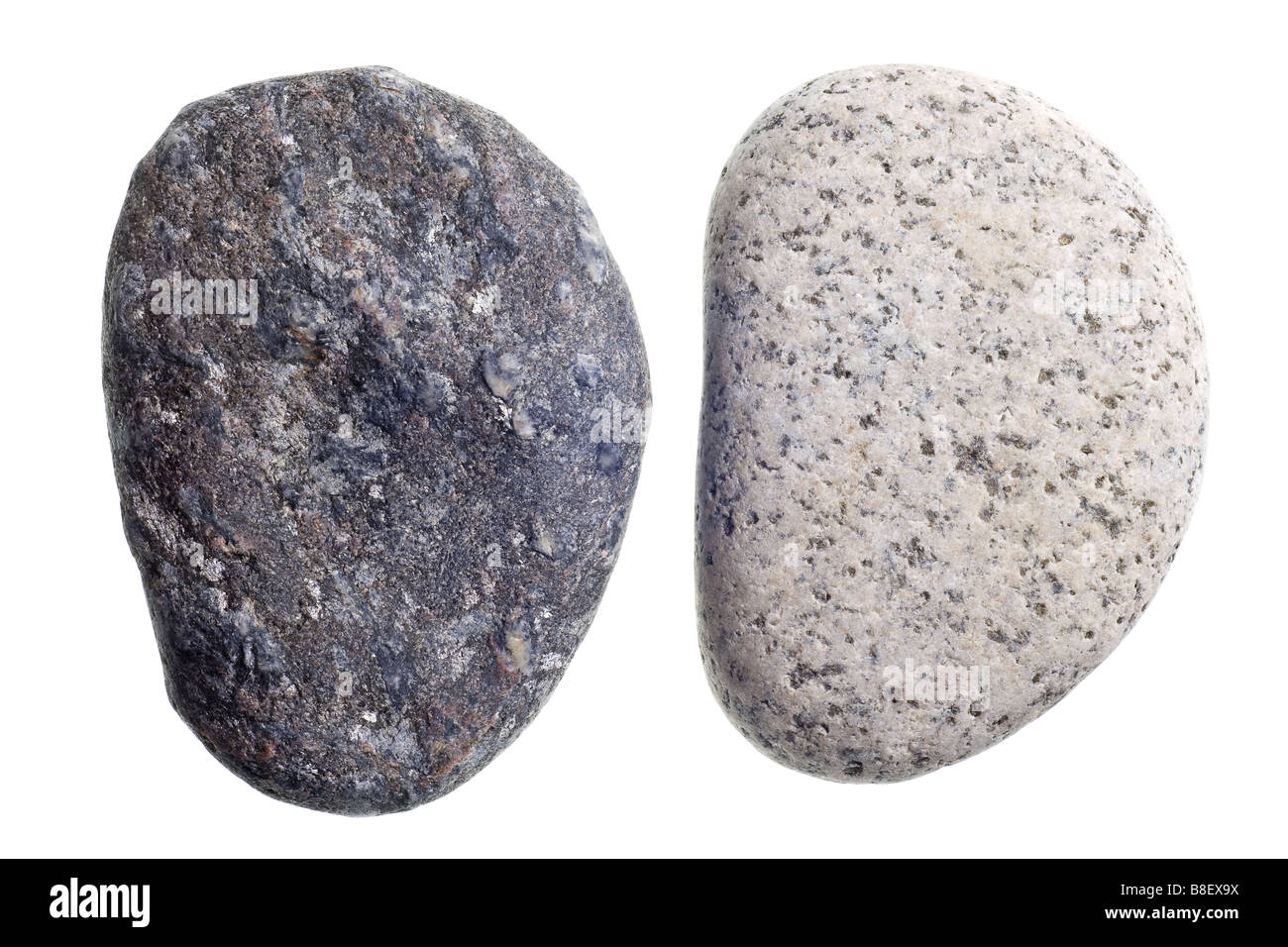 Flattened river rocks isolated on white background Stock Photo - Alamy