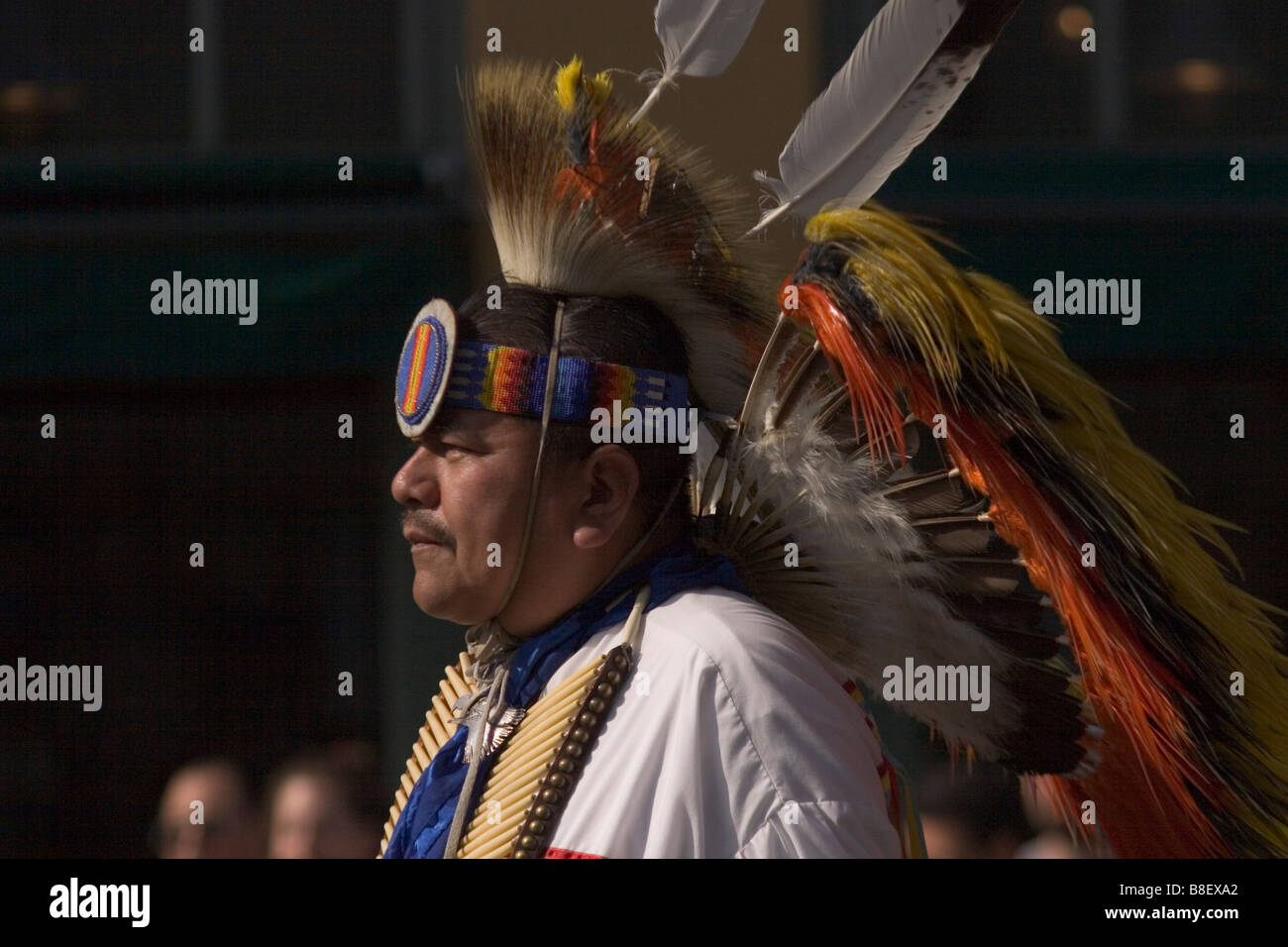 Member of native American dance troupe that performs Native American ...